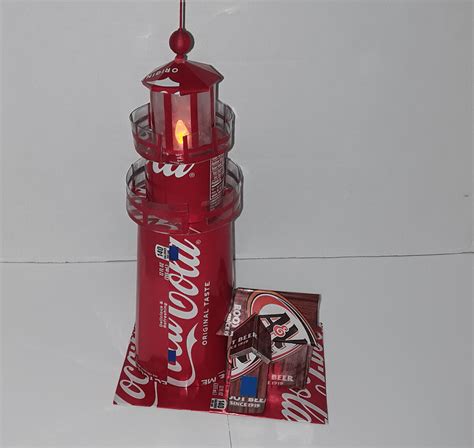 working soda can lighthouse made from coke aandw root beer cans and a