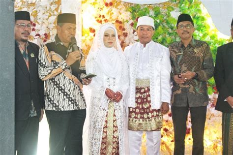 Wedding Ceremony Of The Indonesian Bride And Groom Signing The