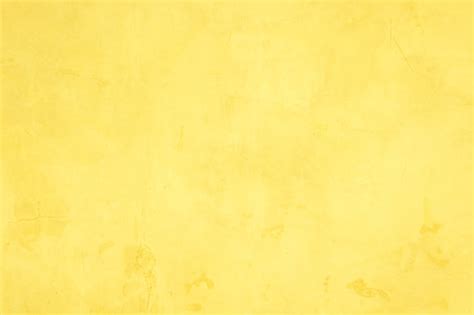 텍스처 배경에 대한 콘크리트 벽 노란색 색상 추상 그런지 밝은 다채로운 색상 배경 성장 효과 파스텔 옐로우 컬러의 로우 콘트라스트는 거칠고 요철이 특징입니다 배경 주제에