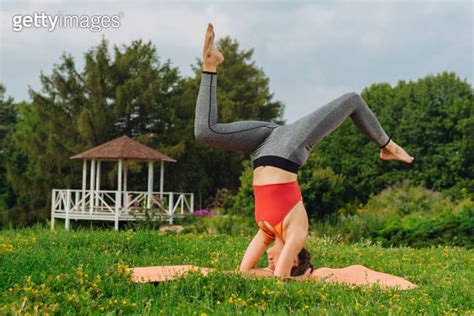 Woman Stretching Her Body While Doing Morning Exercises 이미지 1018241852