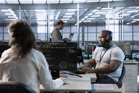 Engineer In Data Center Coordinating Deployment Of Server Architecture