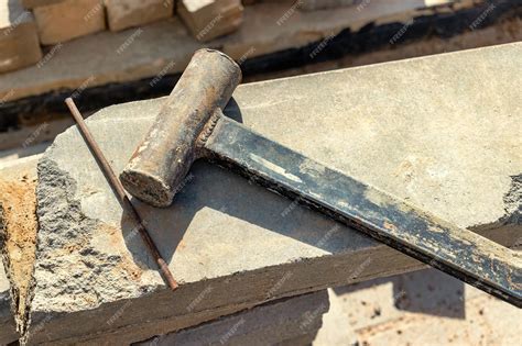 Premium Photo A Sledgehammer Or Hammer Made By Workers Licks On A