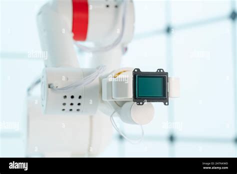 robot arm with ccd and cmos matrix image sensor in the manipulator