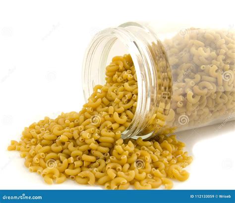 Elbow Macaroni Noodles Pouring Out Of A Jar Stock Image Image Of Indoors Dinner 112133059