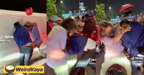 2 Men Fight With Each Other Using Motorcycle Helmets At Sg Customs