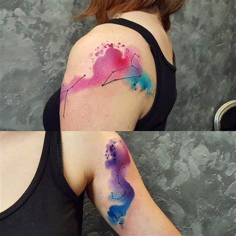 Watercolor Style Shoulder Tattoo That Includes The