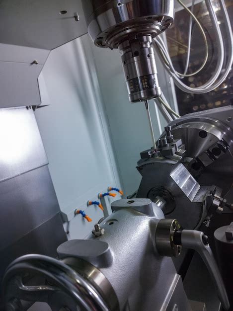 Premium Photo Unadorned Photo Of Automated Contact Probe Measuring While Producing Metal Part