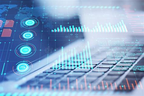 close up of laptop with glowing digital interface business charts and