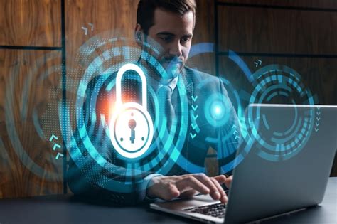 Premium Photo Businessman In Office Working With Laptop Develop Data Protection System To