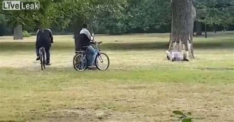 They Have Sex In The Park While Passers By Laugh And Wave Photo