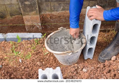 Employees Pouring Mortar Into Bricks Blocks Stock Photo 2014829693 Shutterstock