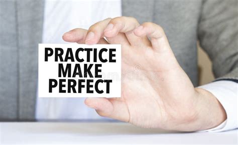 Man S Hand Holding Paper Sheet With Practice Make Perfect Words Stock