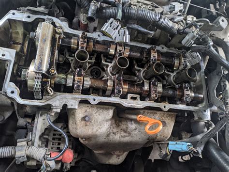 Замена сальников свечных колодцев Nissan Almera n16 — Nissan Almera II ...