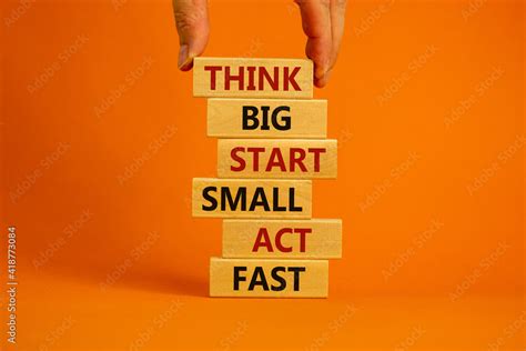 Think Big Start Small Symbol Words Think Big Start Small Act Fast On Wooden Blocks On A
