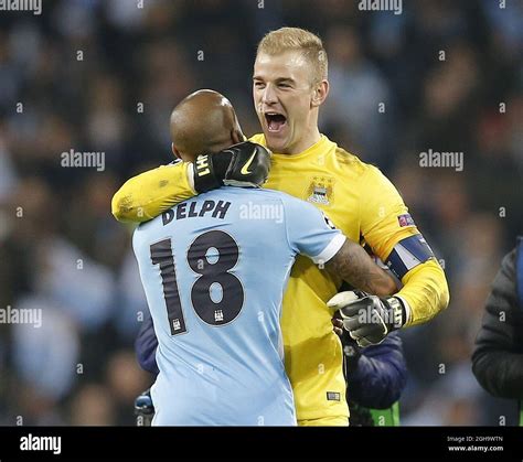Fabian Delph Of Manchester City Celebrates The Win With Joe Hart Of Manchester City During The