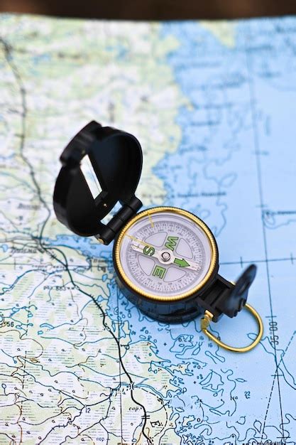 Premium Photo Map And Compass