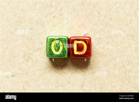 Metallic Color Alphabet Letter Block In Word Od Abbreviation Of Overdraft On Wood Background