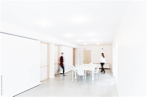 Co Working In Modern Bright Office Space By Stocksy Contributor Carey Shaw Stocksy