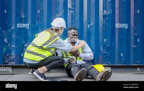 A Female Dock Worker Helping Her Colleague In A Container Terminal Thailand Bangkok Stock