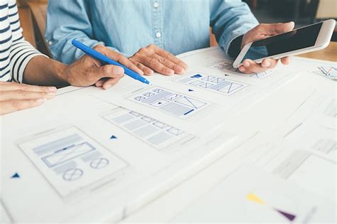 Premium Photo Creative Web Designer Planning Application And Developing Template Layout