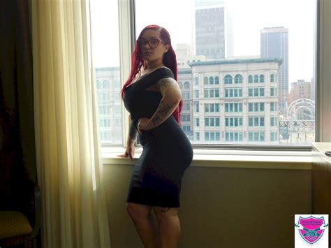 Heavily Tattooed Babe Santana Red Wearing Sexy Lingerie While Posing Photos