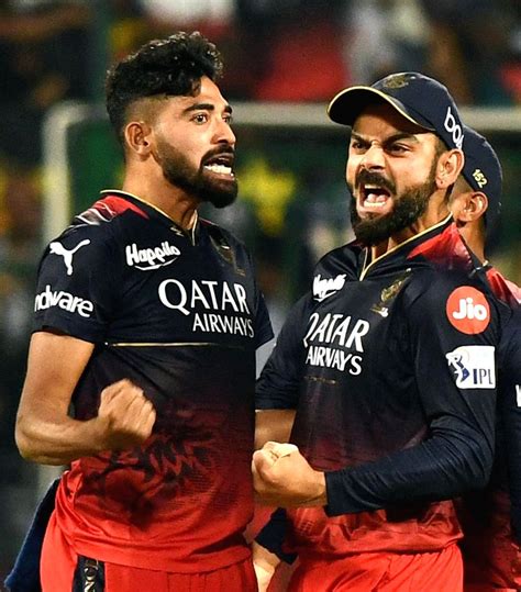 Bangalore Rcb Bowler Mohammed Siraj With Teammate Celebrate The Dismissal Of Ckss Ruturaj Gaikwad