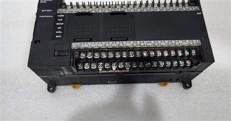 OMRON CP1L M60DR A PROGRAMMABLE CONTROLLER 100 240VAC