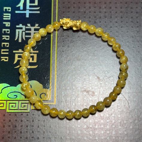 Queen เสริมโชคลาภกับ ไหมทอง And ปี่เซียะทองคำ การเสริมดวงด้วยการมี ไหมทอง และ ปี่เซียะ ถือ