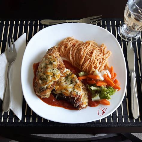 Cheese And Herb Crusted Chicken Parmigiana With Spaghetti And