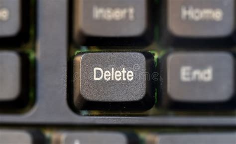 Focus On A Single Delete Key On A Laptop Computer Keyboard Top Down View From Above Macro