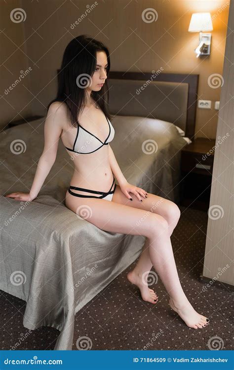 Woman Sitting In Lingerie On The Bed Stock Image Image Of Erotic