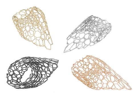 Zaha Hadid Creates Rings From Gold Lattices For Caspita