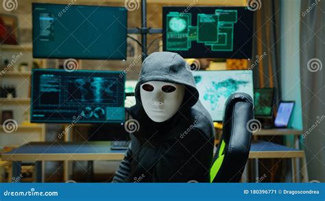 Masked Hacker Wearing A Hoodie To Hide His Identity Stock Image Image Of Hacker Hacking