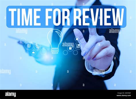 Sign Displaying Time For Review Word Written On Formal Assessment Of Something With Intention