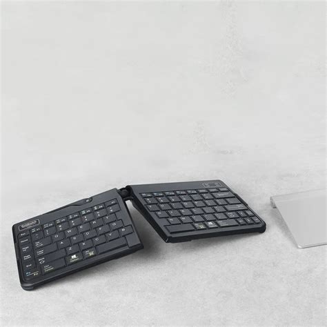 Wireless Split Keyboard Ergonomic Bluetooth Keyboard Multi System Foldable Hand Guard Wrist