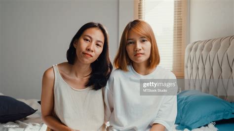 Young Beautiful Asian Lesbian Lgbt Lady In Bedroom Happy Girls Show