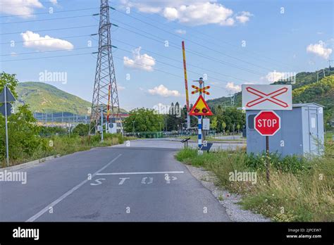 Single Tracks Railroad Crossing Stop Sign And Warning Lights Stock