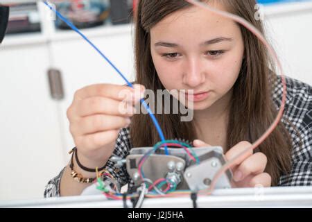 Babe Girl In Electronics Laboratory Experiment With Microcontroller And Robot Cnc Module