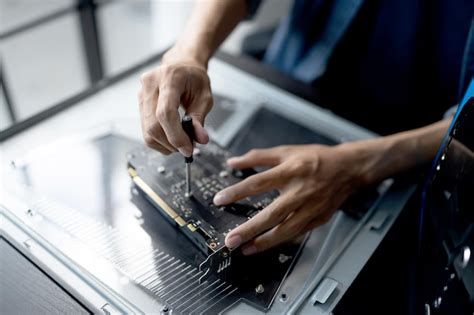 Premium Photo It Engineer Installing Hardware Equipment Development