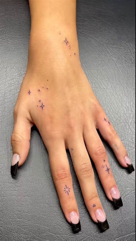 Small Star Hand Tattoo Sparkles On Hand Tattoo Dainty Tattoos