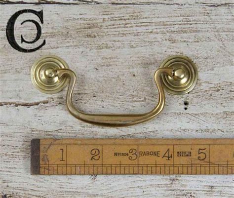 Looking Good Brass Swan Neck Handles Cabinet And Furniture Pulls