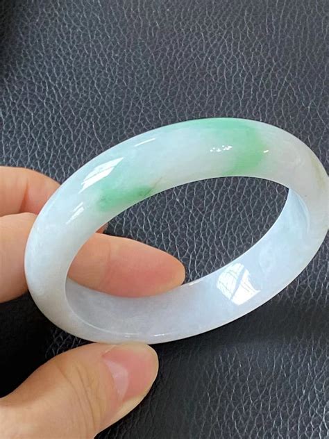 Natural White Jadeite Bangle 558 Mm Certificated Grade A White Jadeite With Pure Green Floats