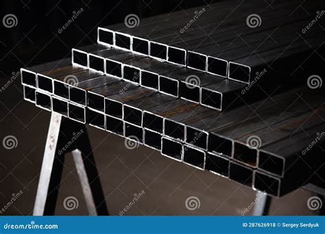 Stack Of Square Steel Tubes Profile Or Pipes For Construction Supplies And Welding Works