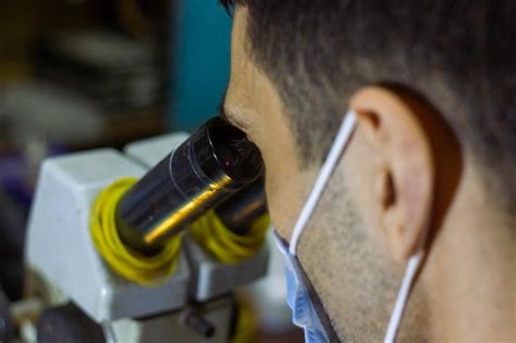 Premium Photo Man With Black Rubber Glove Repairing Mobile Phone Man