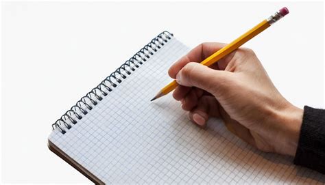 Premium Photo Mead Composition Notebook On An Isolated Background The Hand Writes In Pencil