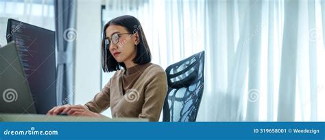 Asian Prompt Engineer Develop Coding App With Software Data Sitting In