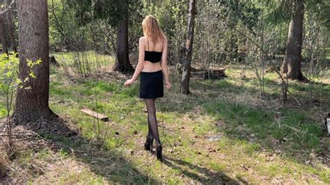 A Girl In Extremely High Heels Centimeters Steps On The Glue Of Her Shoes And Sticks To The