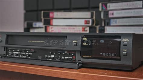 Insert Vhs Cassette Into Vcr And Push Play Button Stock Footage Video