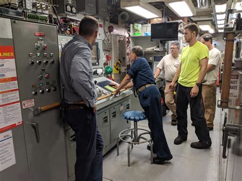 Engine Department Crew Members In The Engineering Operating Space