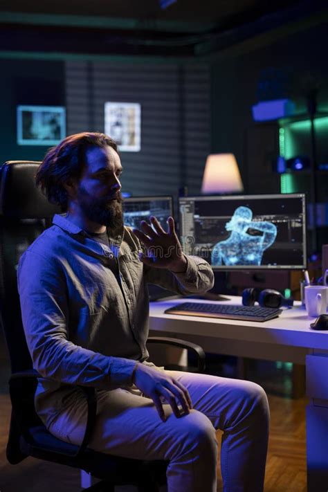 Sentient Ai Taking Control Of Creator In Neon Lit Apartment Moving His Limbs Stock Image